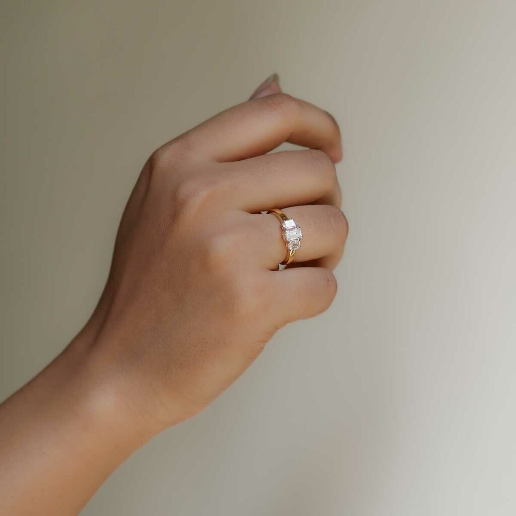 Buy Triad Emerald Diamond Solitaire Ring At Jewelbox